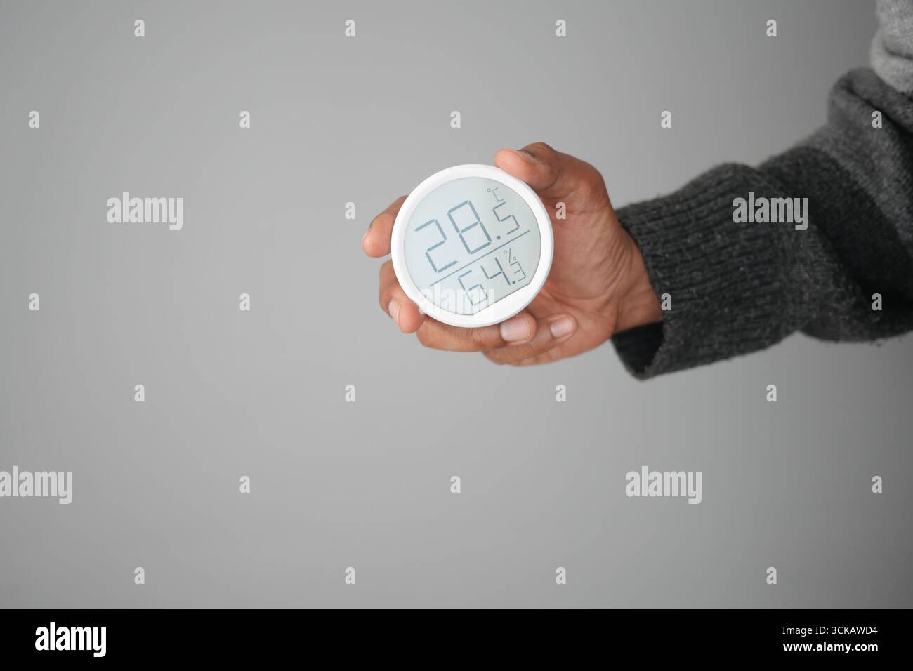 Measuring indoor temperature and humidity for comfort Stock Photo - Alamy