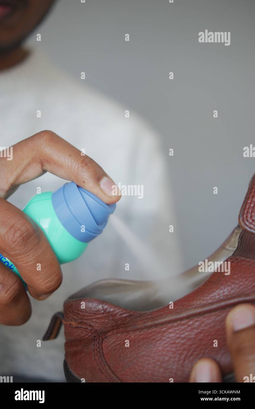 Applying shoe care product hi-res stock photography and images - Alamy