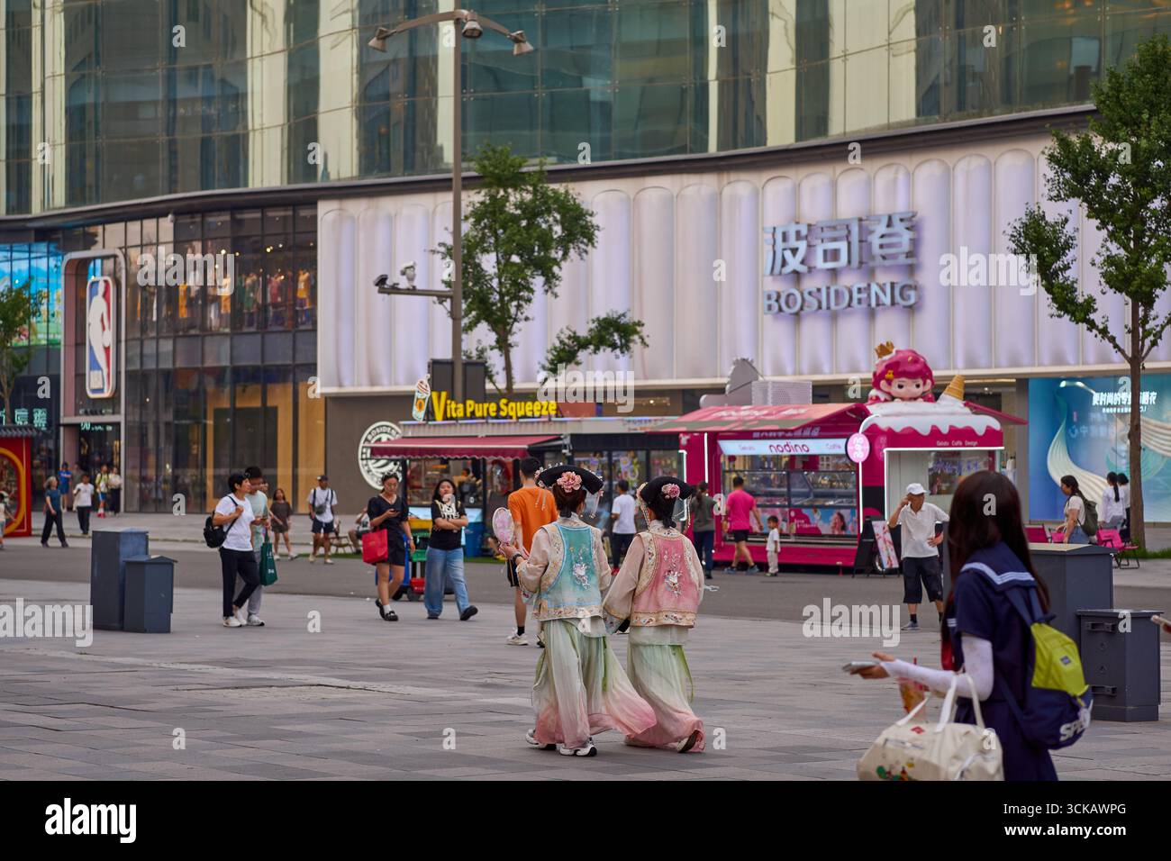 Two Chinese women in traditional Hanfu costume in Wangfujing shopping ...