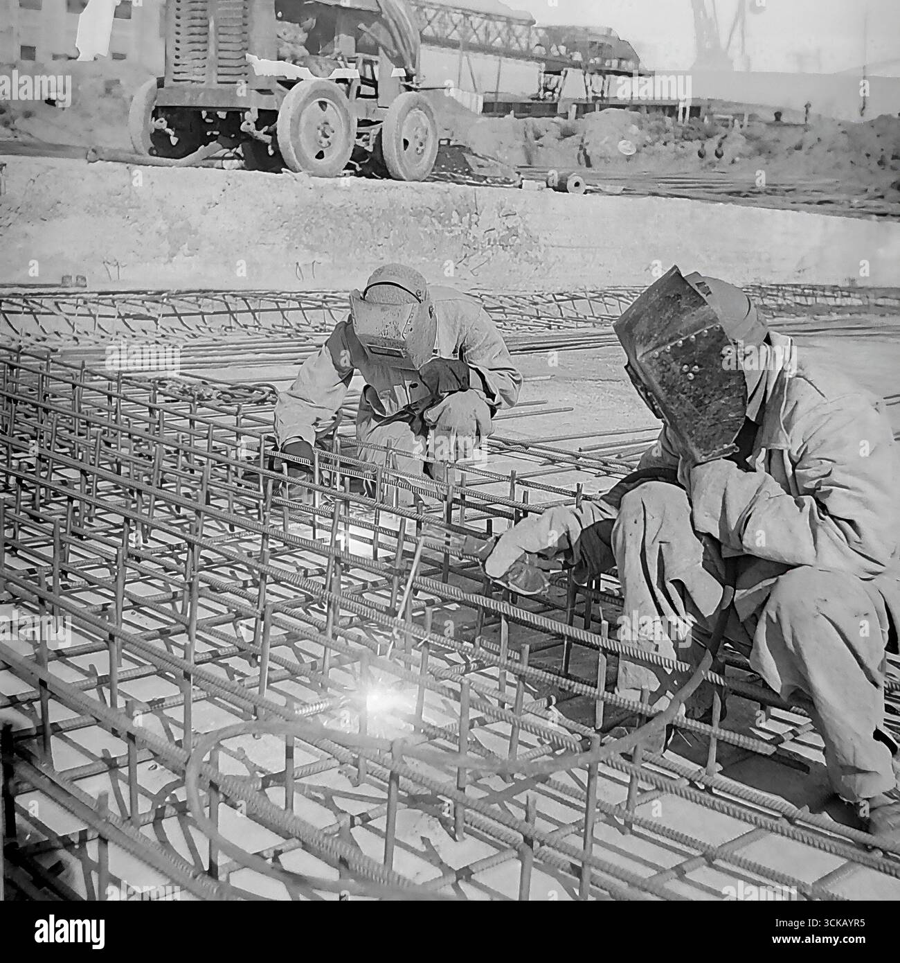 Two electric welders at work on the construction of the Sloviansk GRES ...