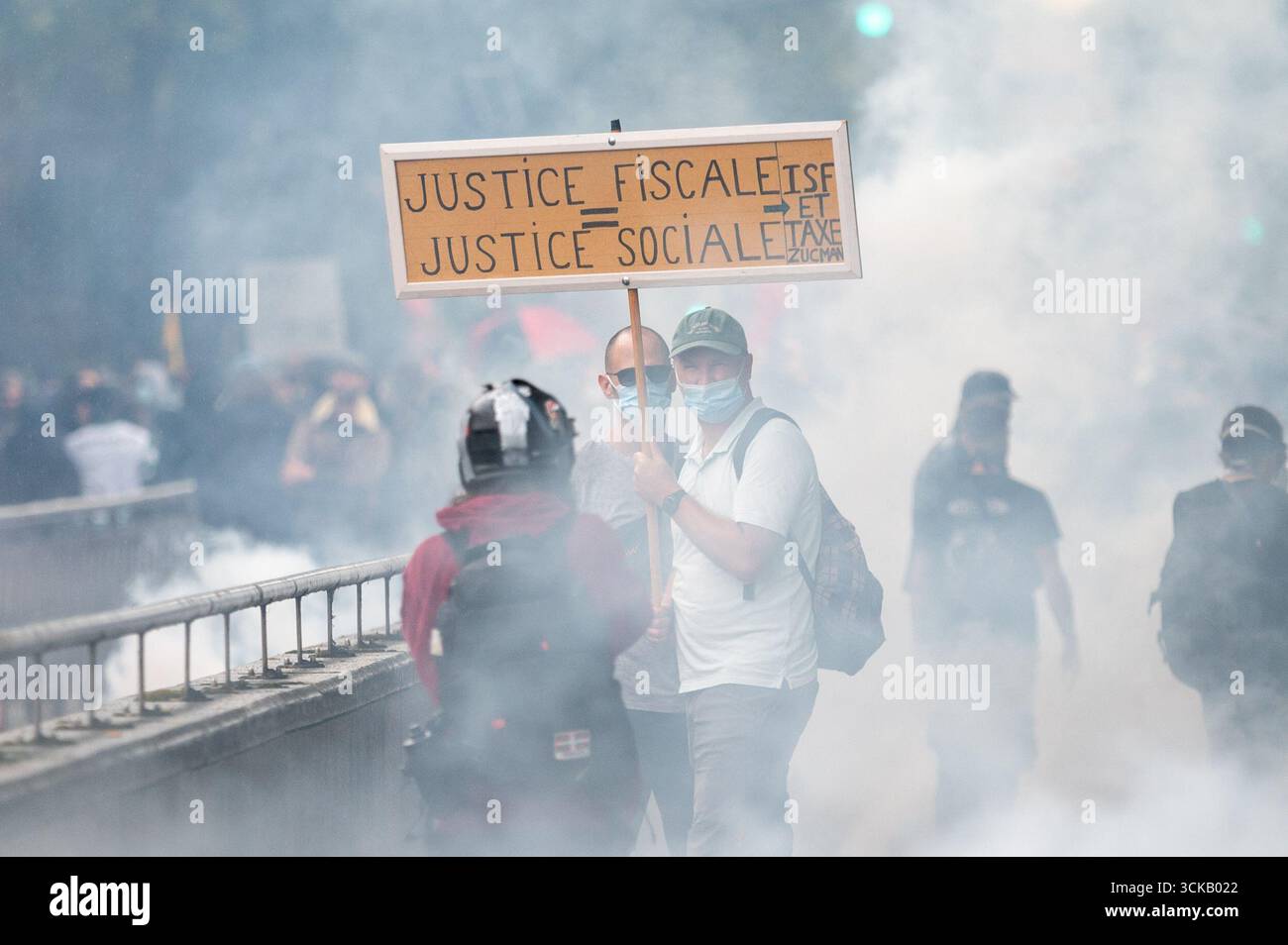 Tear Gas during riots of Bloquons Tout (Block Everything) protest ...