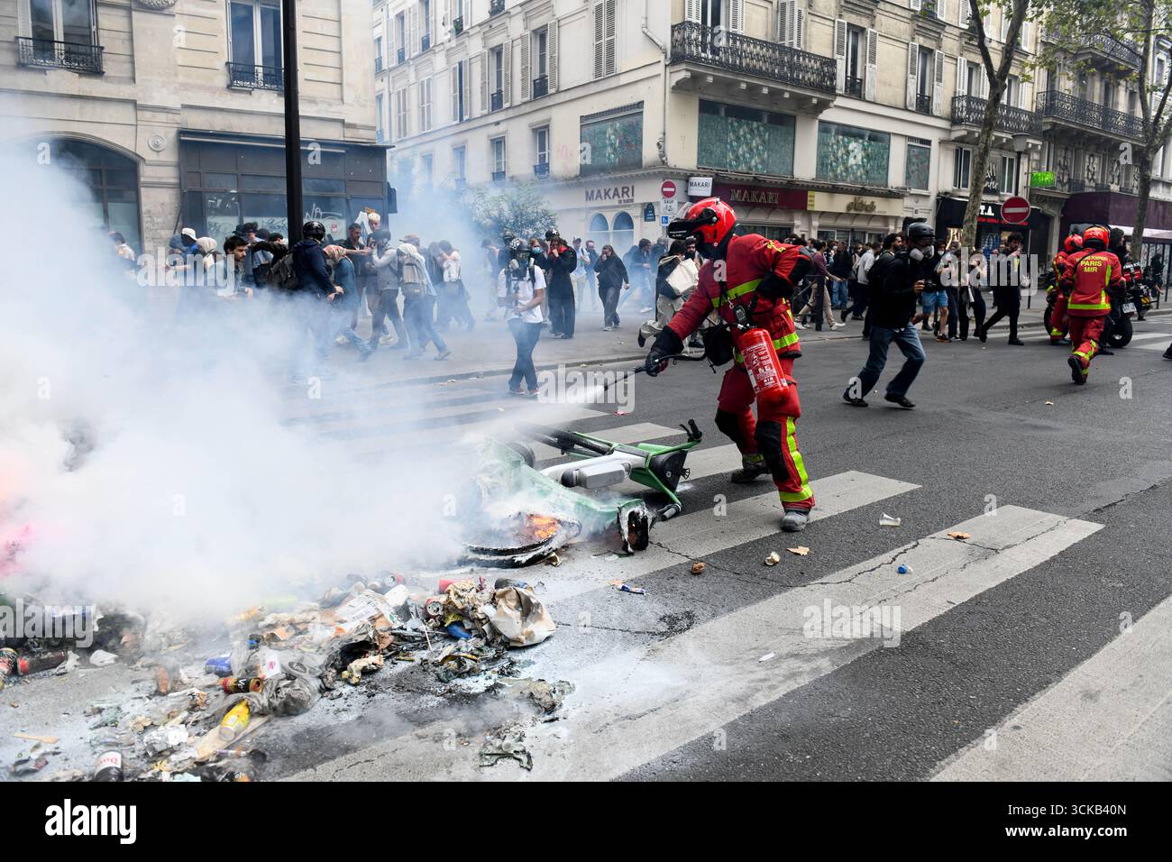 Firefighters respond to a barricade fire in the Les Halles district in ...