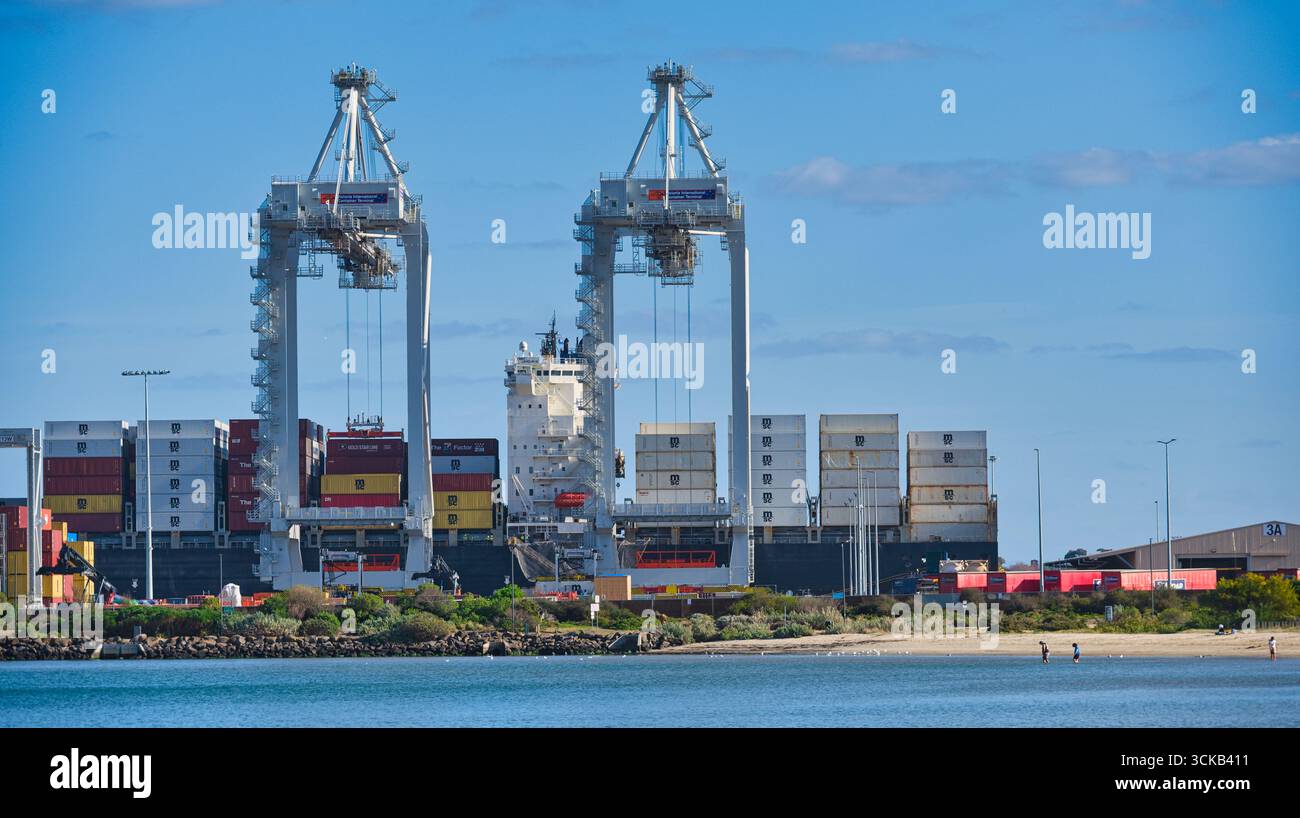 Port Melbourne, Victoria, Australia - 18 July 2025: Twin cranes ...