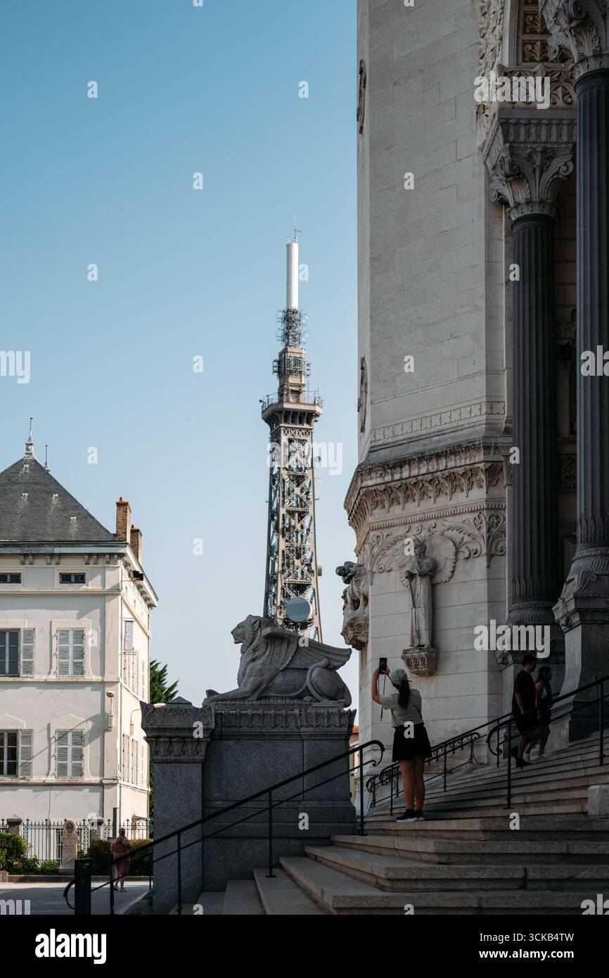 Fourviere Basilica details with sphinx statue and view of Lyons ...