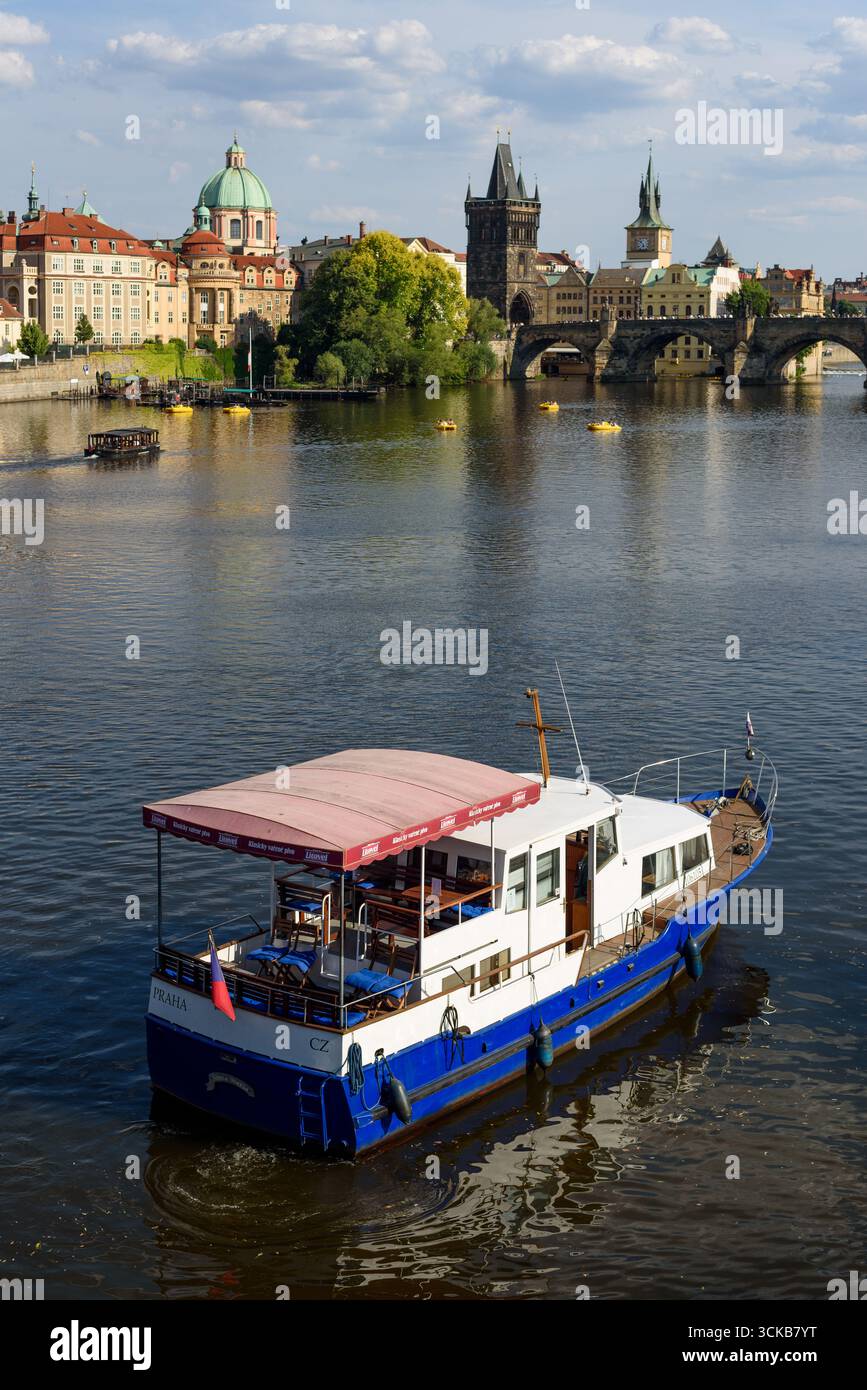 Sightseeing tourist boats on Vltava river in Prague, capital of Czech ...