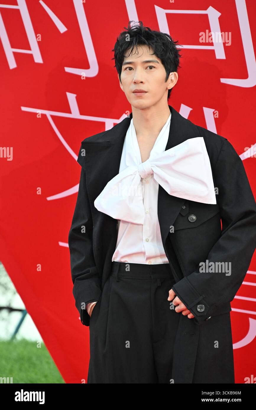 Chinese actor and singer Jing Boran attends an activity in Beijing ...