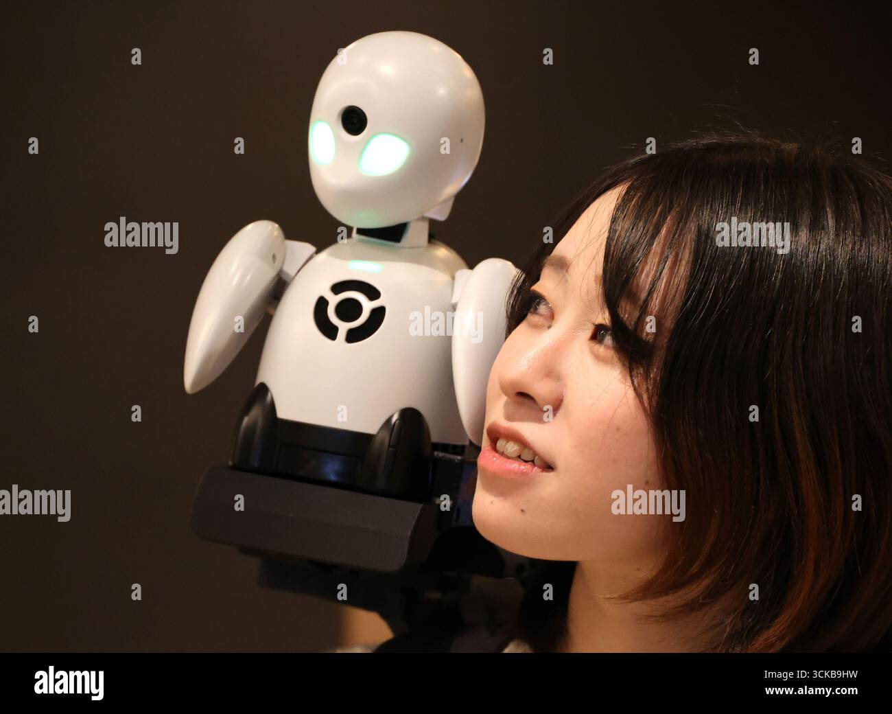 Tokyo, Japan. 11th Sep, 2025. A model demonstrates an avatar robot ...