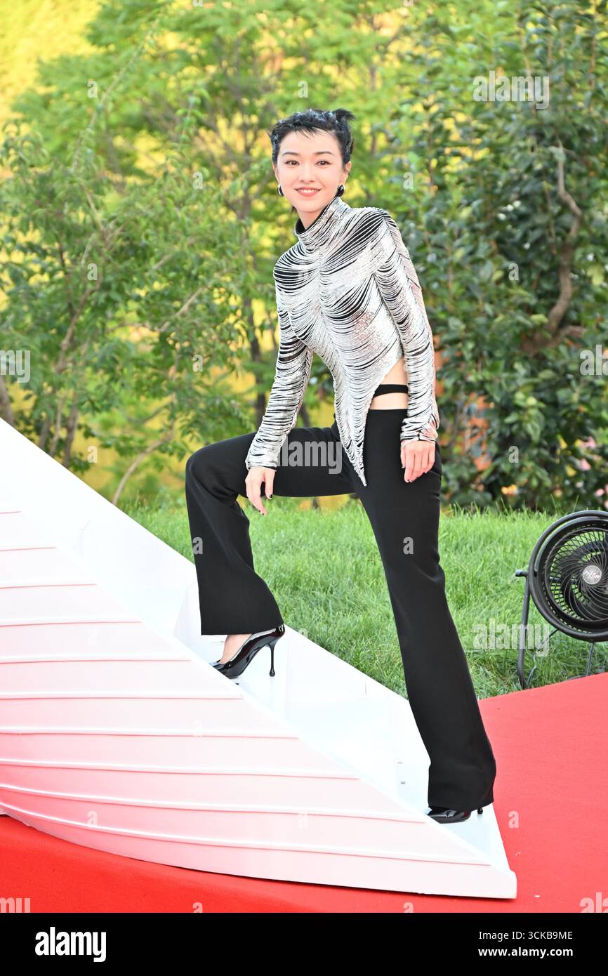 Taiwanese singer and actress Amber Kuo attends an activity in Beijing ...