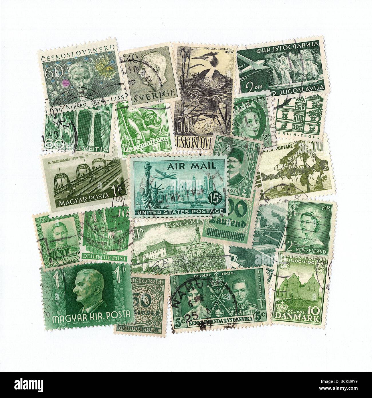 Vintage green postage stamps from around the world isolated on a white ...