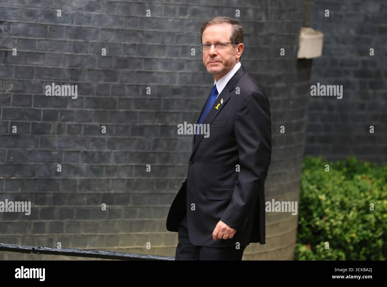 Israeli President Isaac Herzog arrives at Downing Street. (Photo by ...