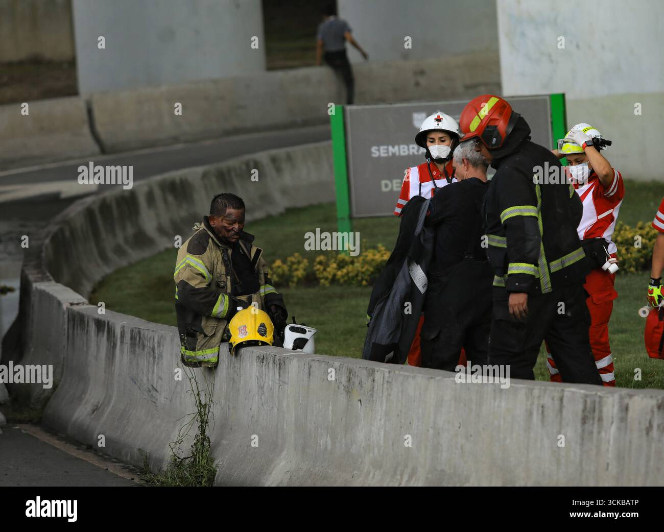 Gas Tanker Explosion Leaves 57 People Injured Paramedics assist a ...