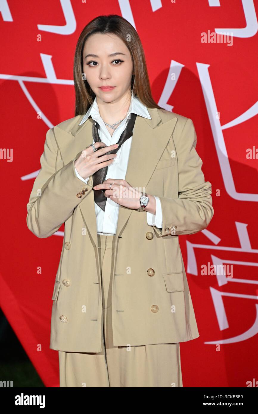 Chinese singer-songwriter Jane Zhang attends an activity in Beijing ...