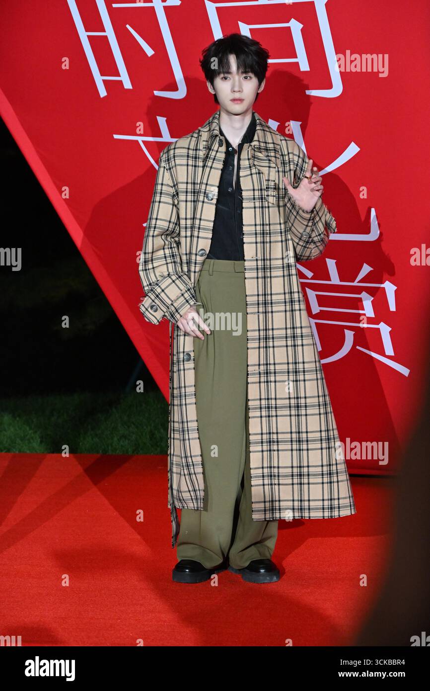 Chinese actor and singer Zhou Yiran attends an activity in Beijing ...