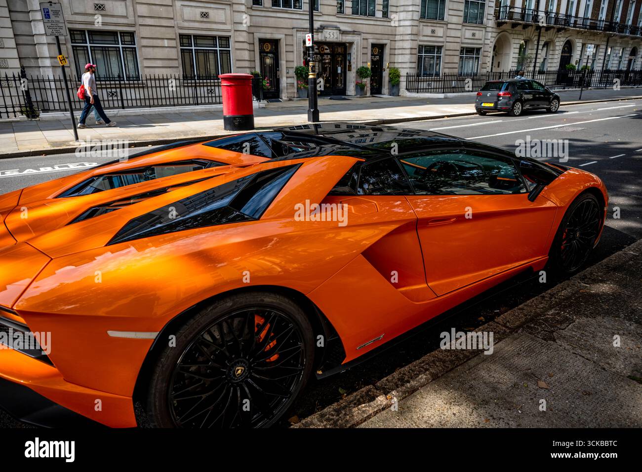 Orange Lamborghini in Portland Place, London, England, UK Stock Photo ...