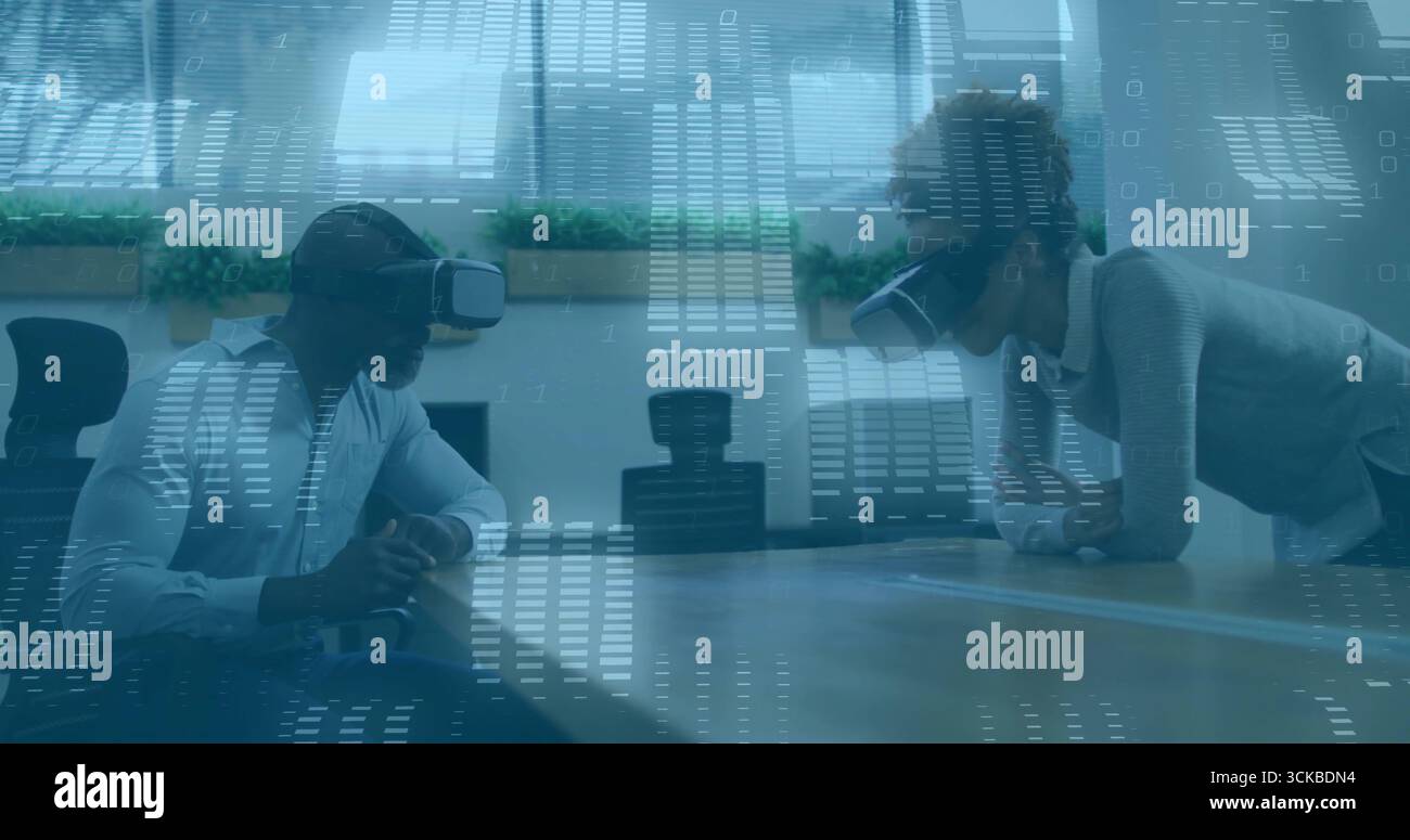 Collaborating colleagues wearing VR headsets in conference room with ...