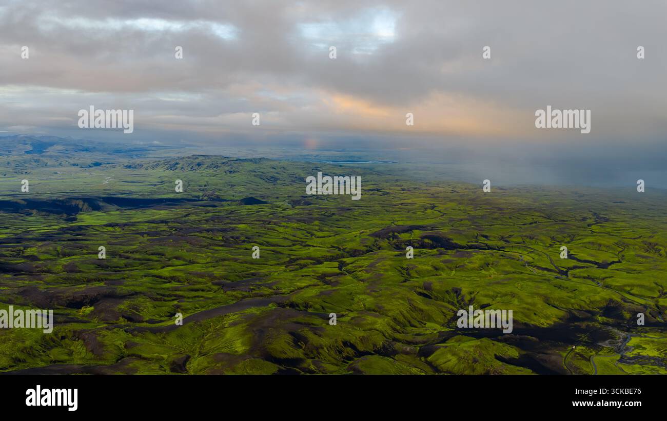 Aerial perspective of Iceland's volcanic terrain with moss covered ...