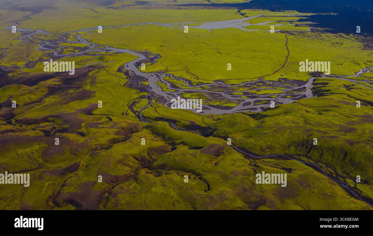 Aerial image of a green moss covered volcanic terrain in Iceland ...