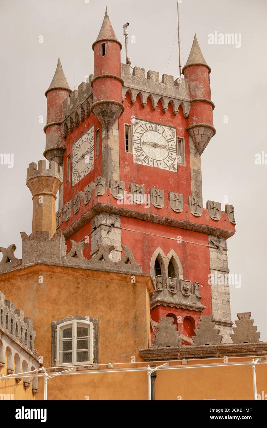 Close-up view of the iconic red clock tower of Pena Palace in Sintra ...