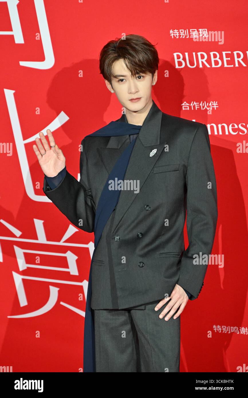 Chinese actor, singer, and dancer Tan Jianci attends an activity in ...