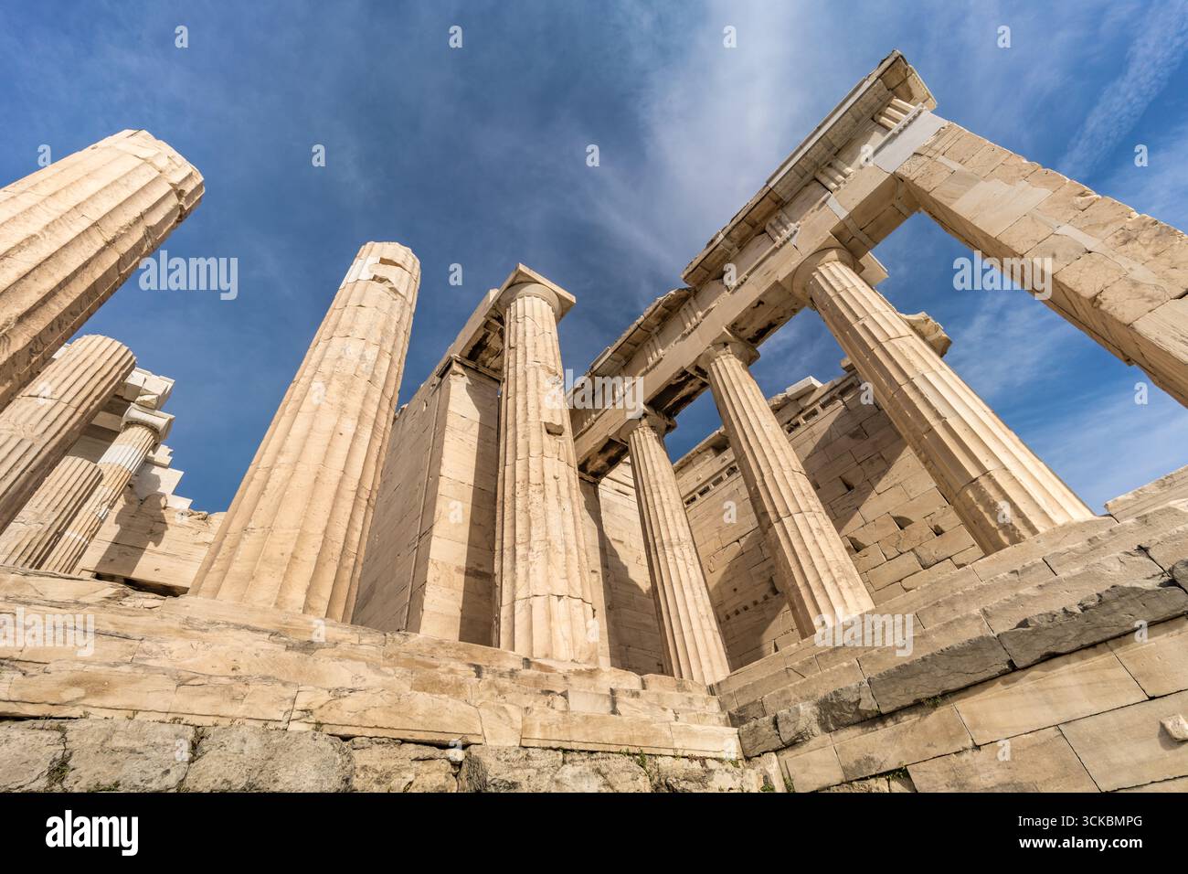 Sunlight illuminating columns at the Propylaea, monumental gateway to ...