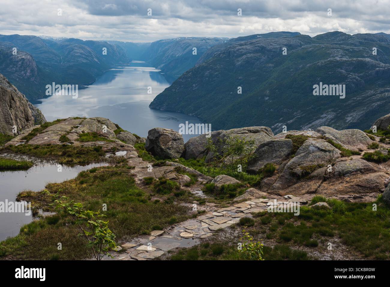 Lysefjord stretches between steep cliffs near Preikestolen, Norway. A ...