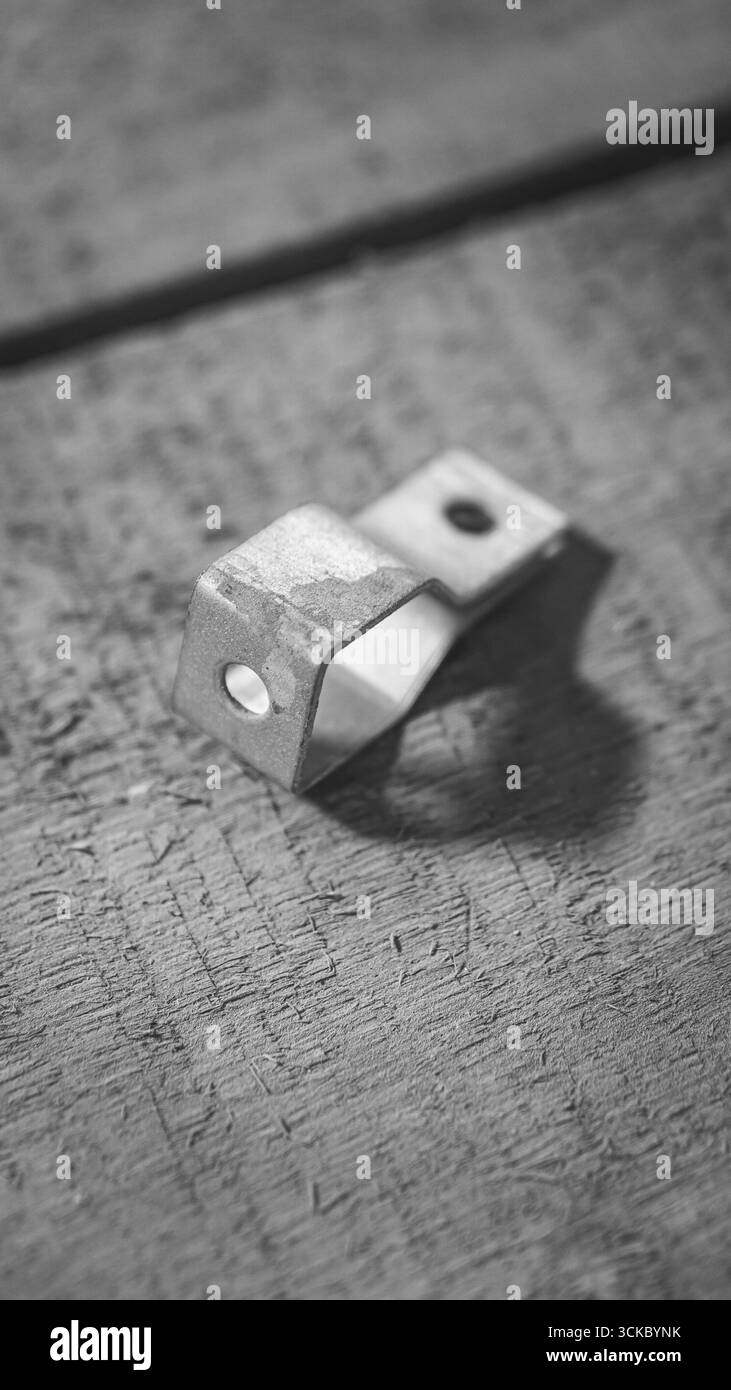 A metal screw showing detailed threads and head, an essential component ...