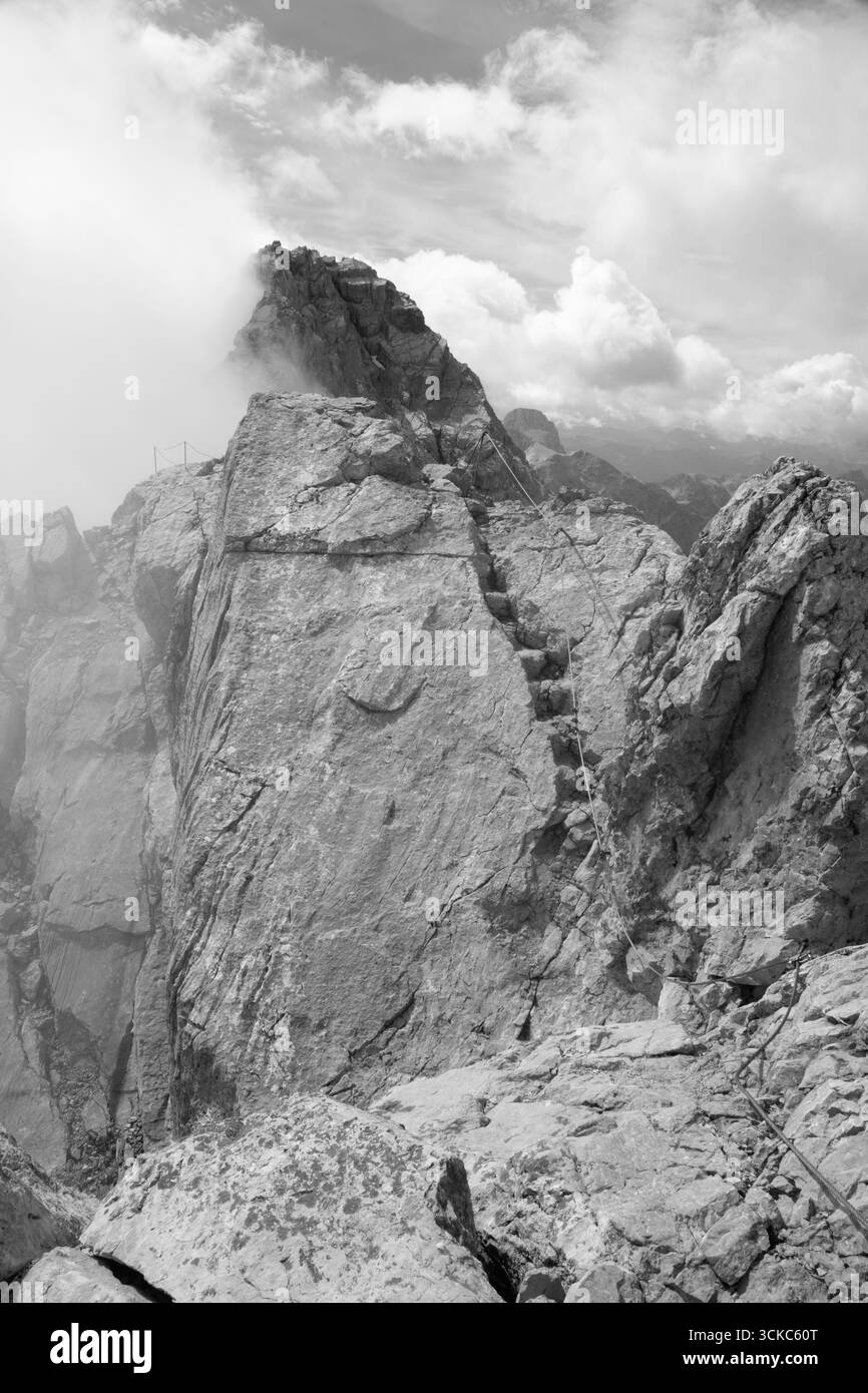Alps - Watzmann peak in the cloud from summit of Hocheck Stock Photo ...
