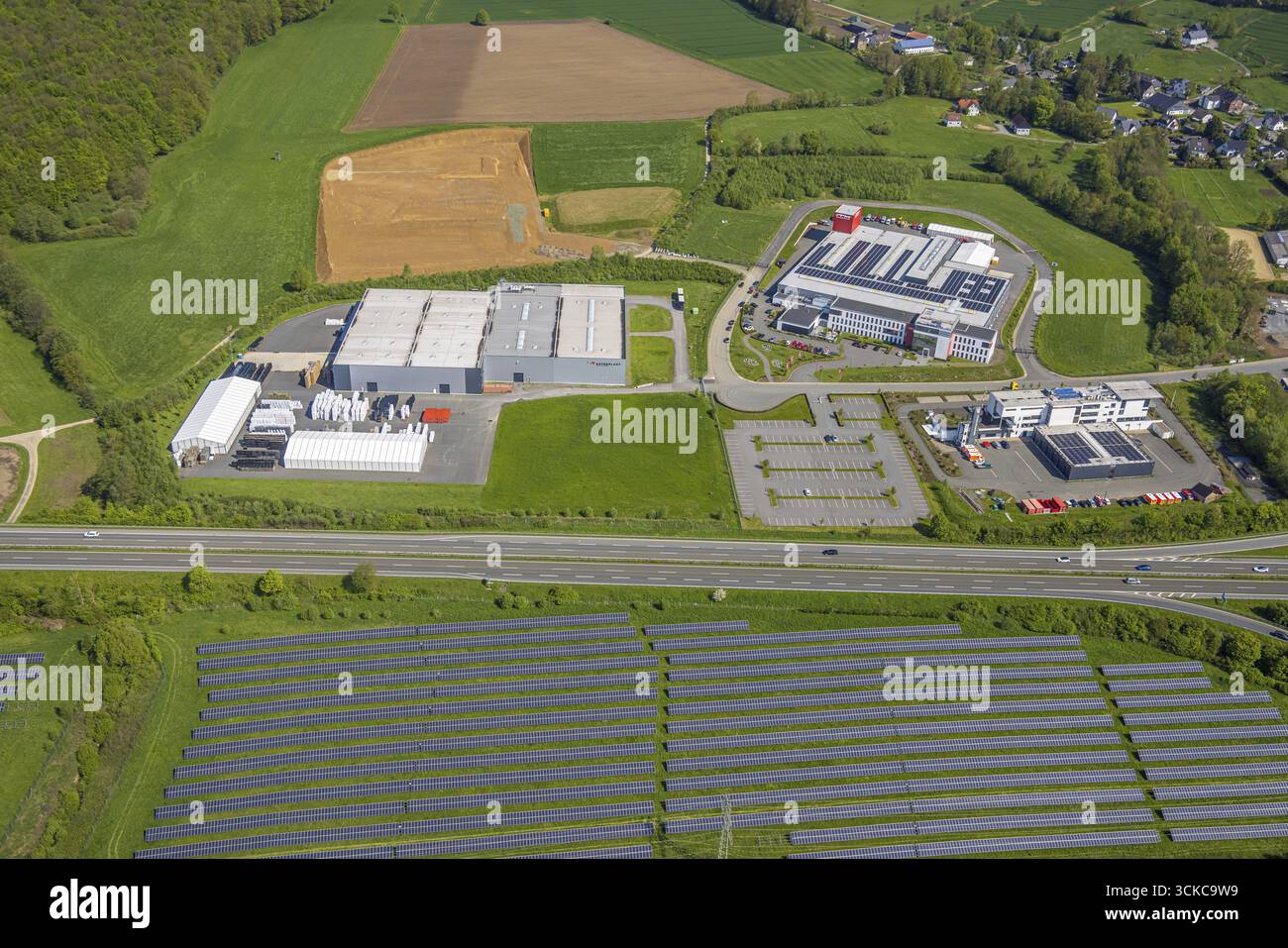 Aerial view, commercial area Enste at the motorway A46, solar park ...