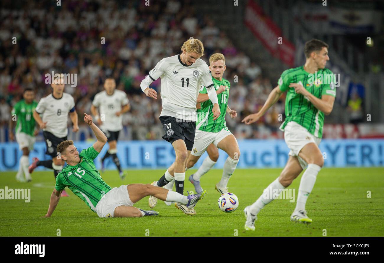 Cologne, Germany. 07th Sep 2025. Nick Woltemade (DFB) Justin Devenny ...