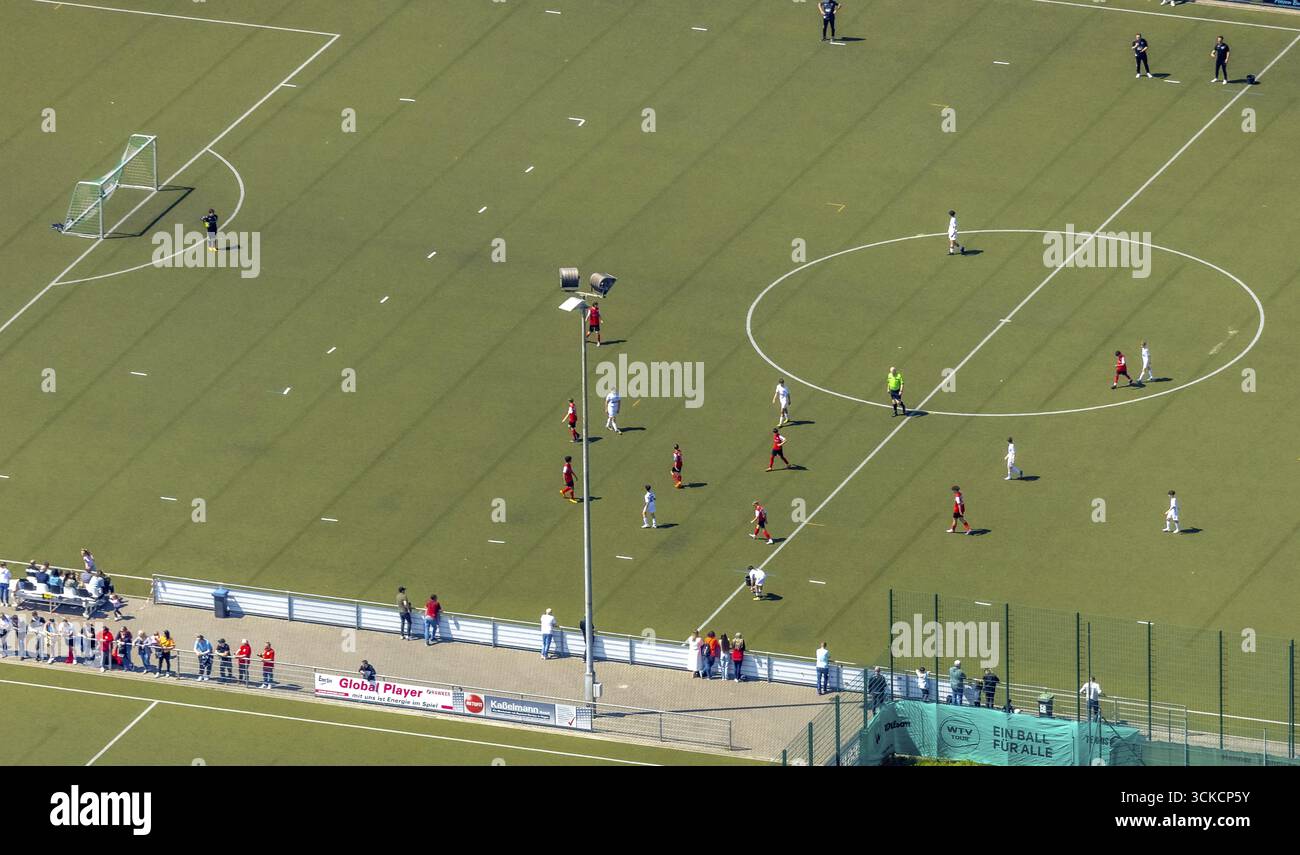 Aerial view, football match on the sports field of the district sports ...