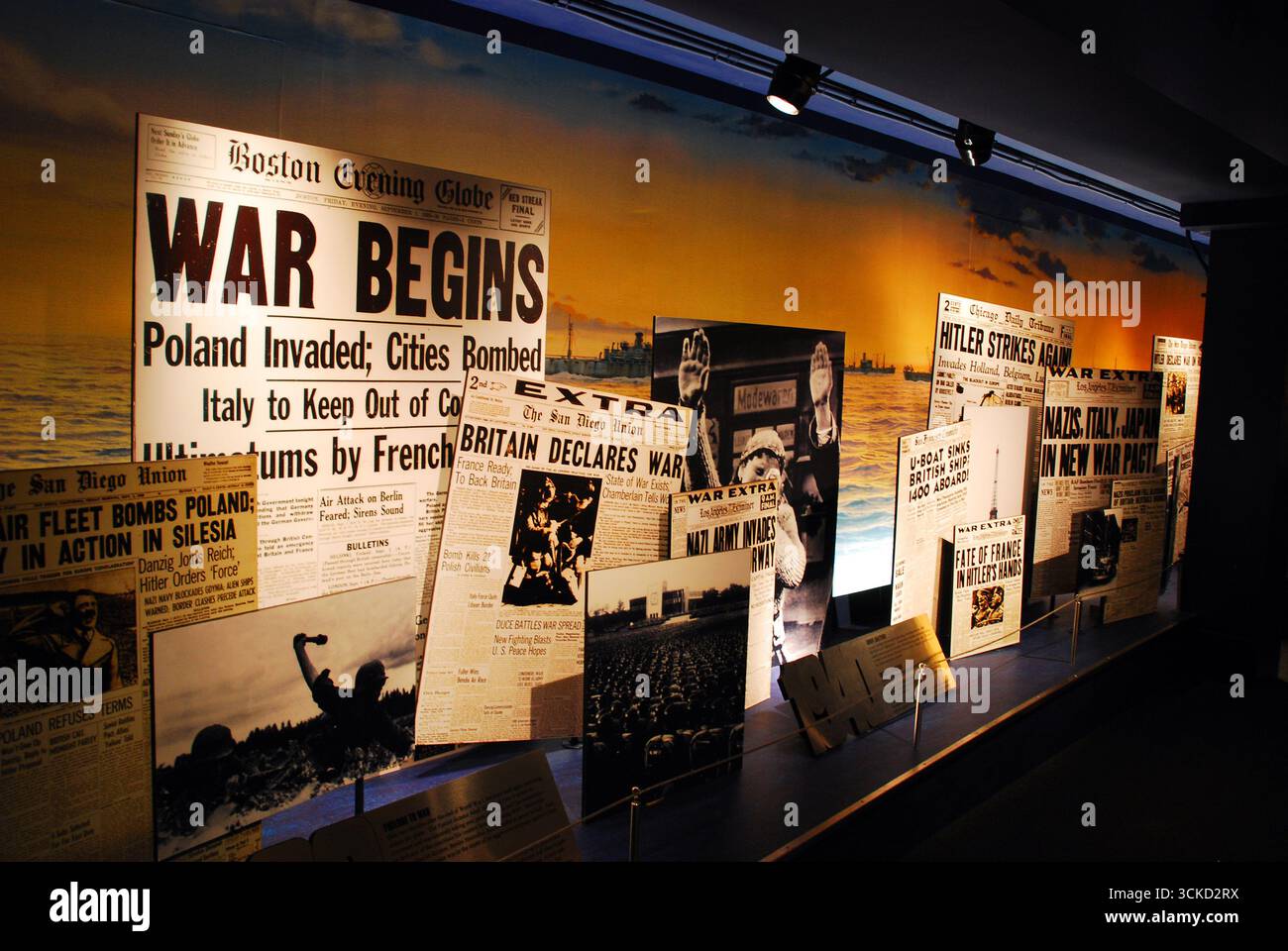 An exhibit of World War II era newspapers line the walls of the Chicago ...