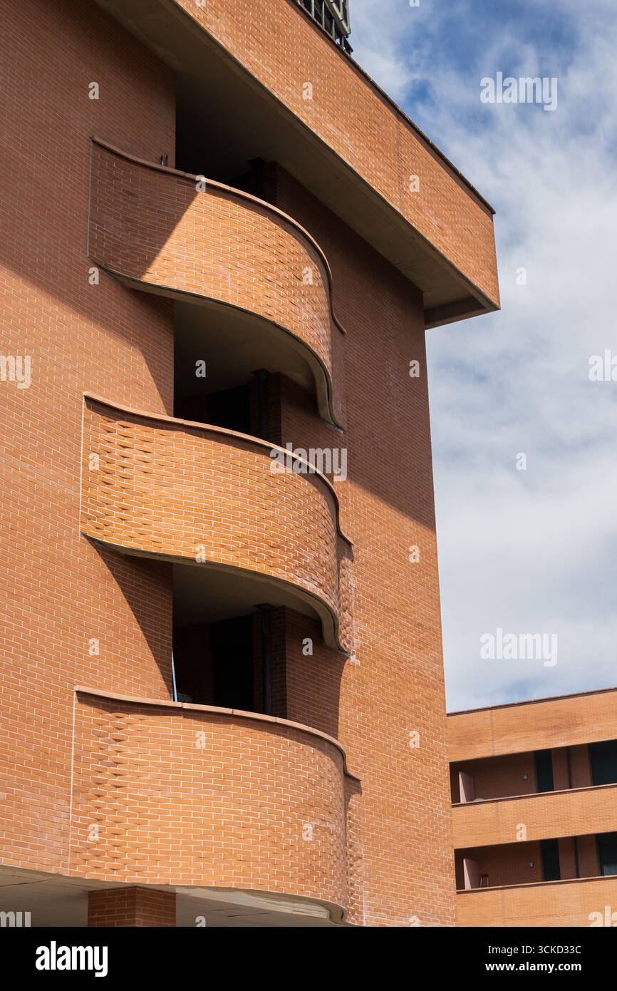 modern brick building with curved balconies Stock Photo - Alamy