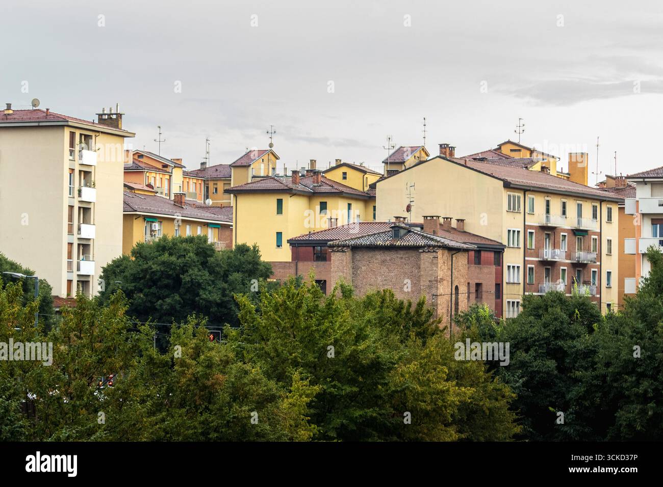 Multi-Story Apartments with Tiled Roofs in Bologna, Italy Stock Photo ...