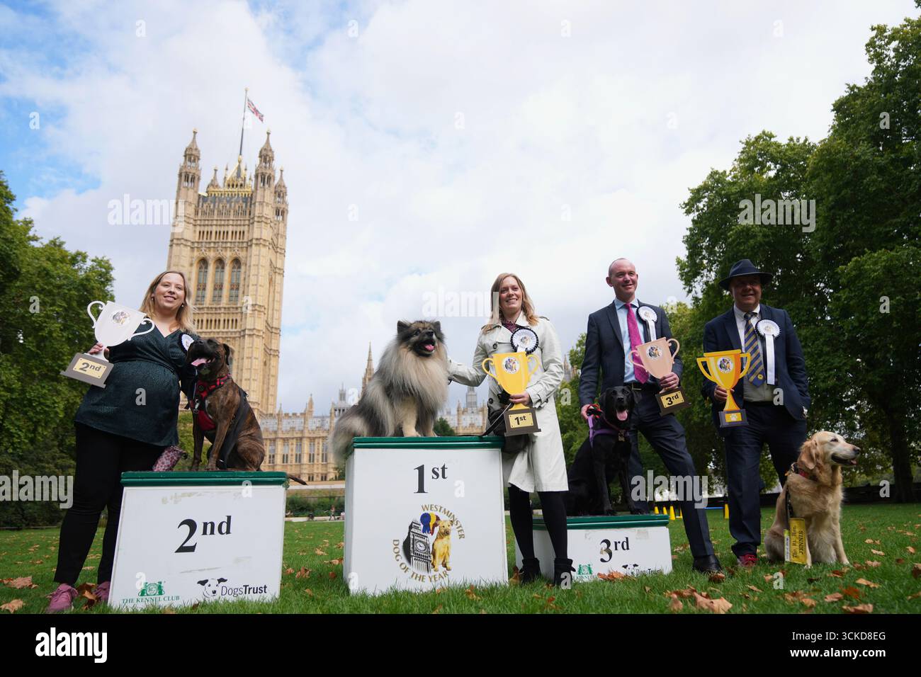 From left, British Member of Parliament and her dog Mabel who finished ...