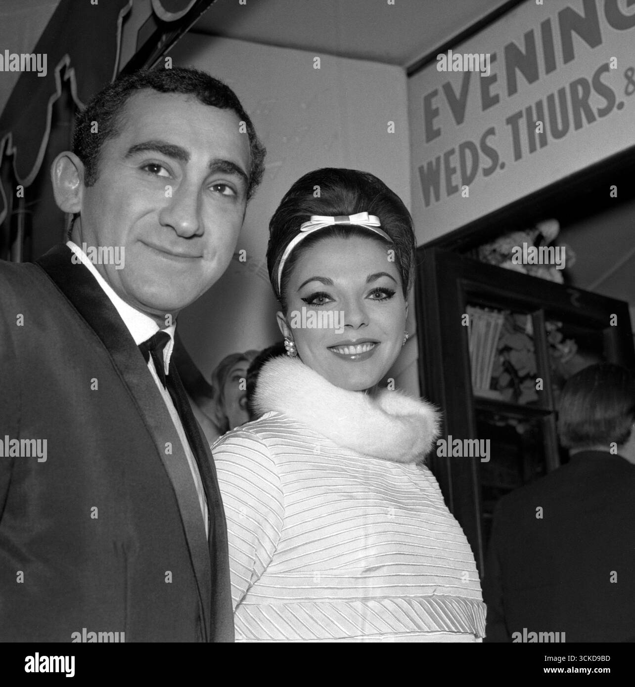 British actress Joan Collins arrives with song writer Lionel Bart at ...