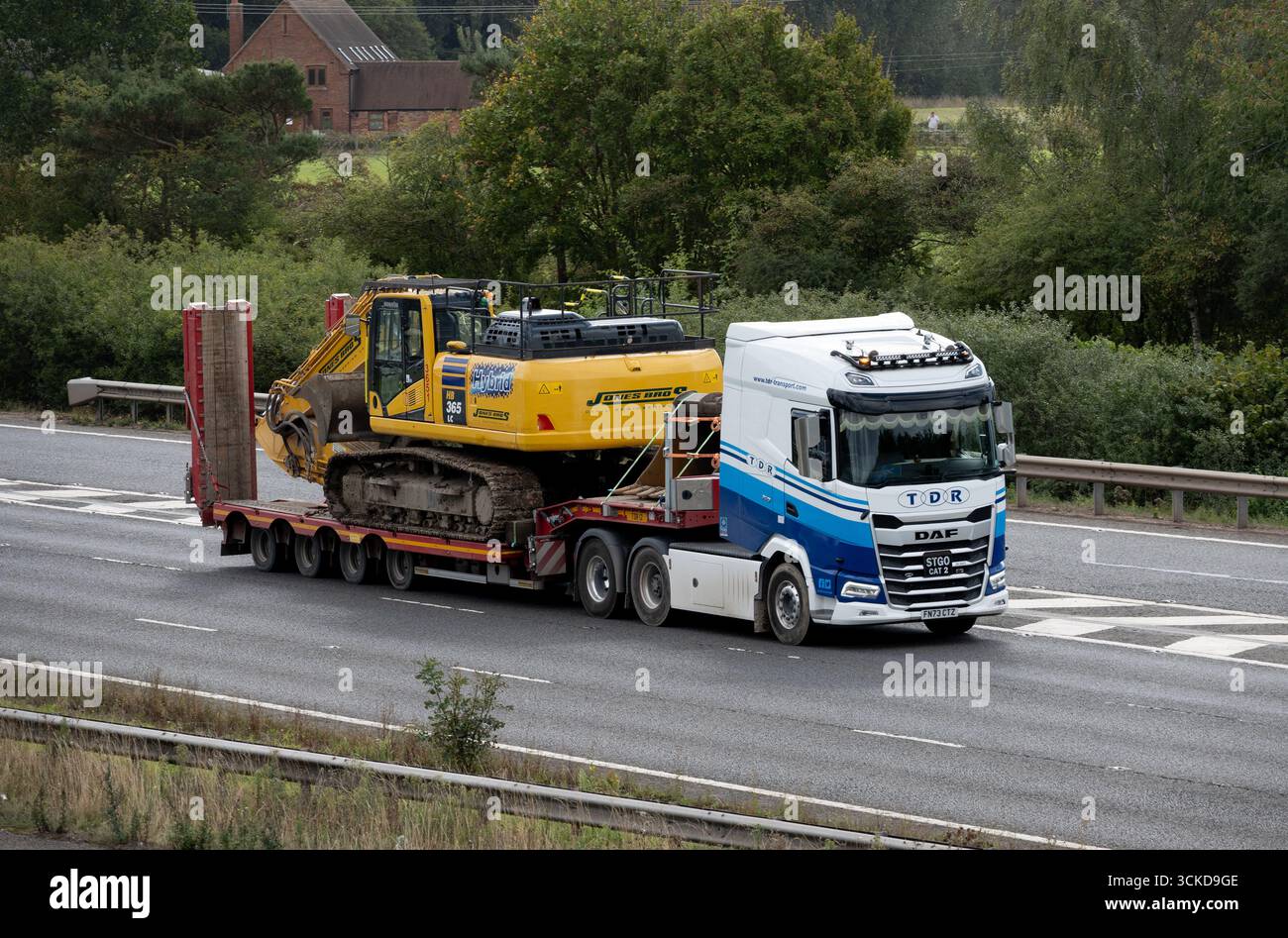 TDR low loader lorry on nthe M40 motorway, Warwickshire, UK Stock Photo ...