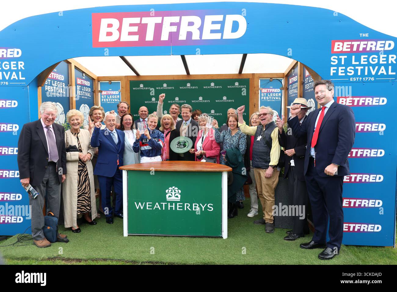 Jockey Saffie Osborne celebrates with the entourage of horse Calendar ...