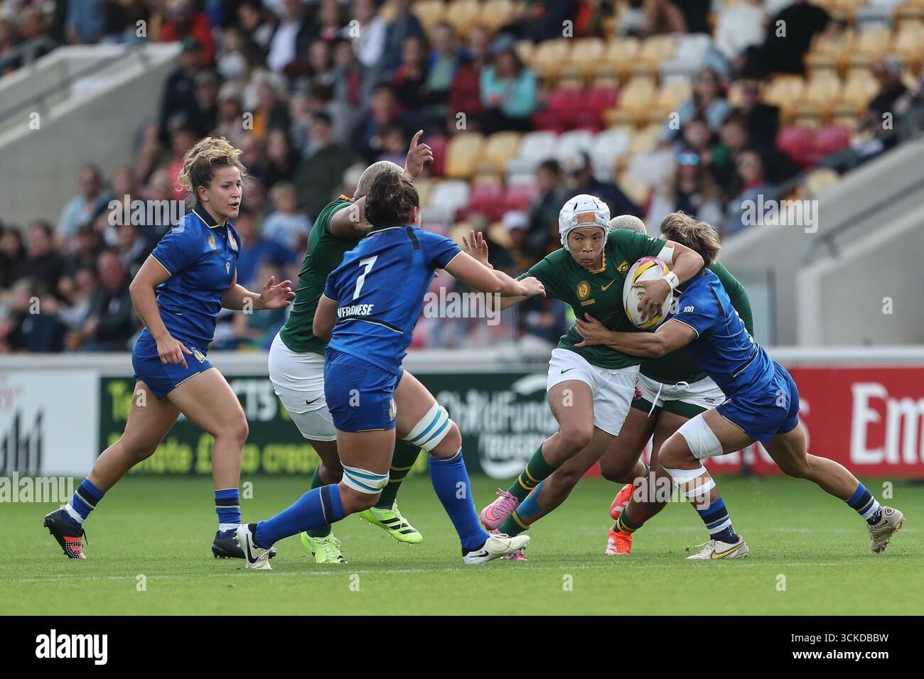 Byrhandre Dolf of South Africa hands off Italy's Beatrice Veronese ...