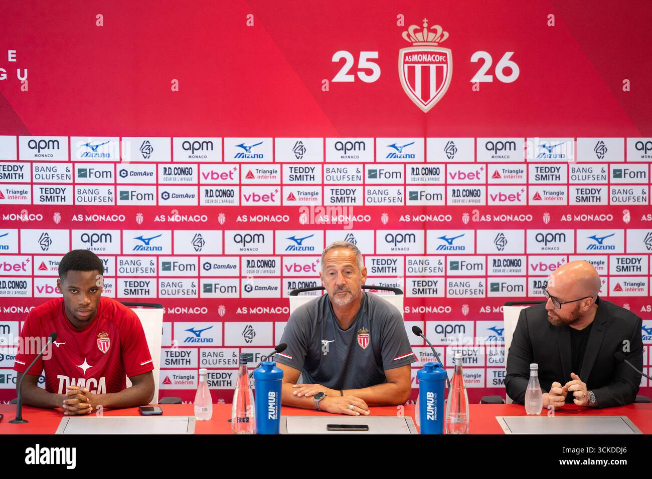 Player Stanis Idumbo (L), Monaco coach Adi Hutter (center),and football ...