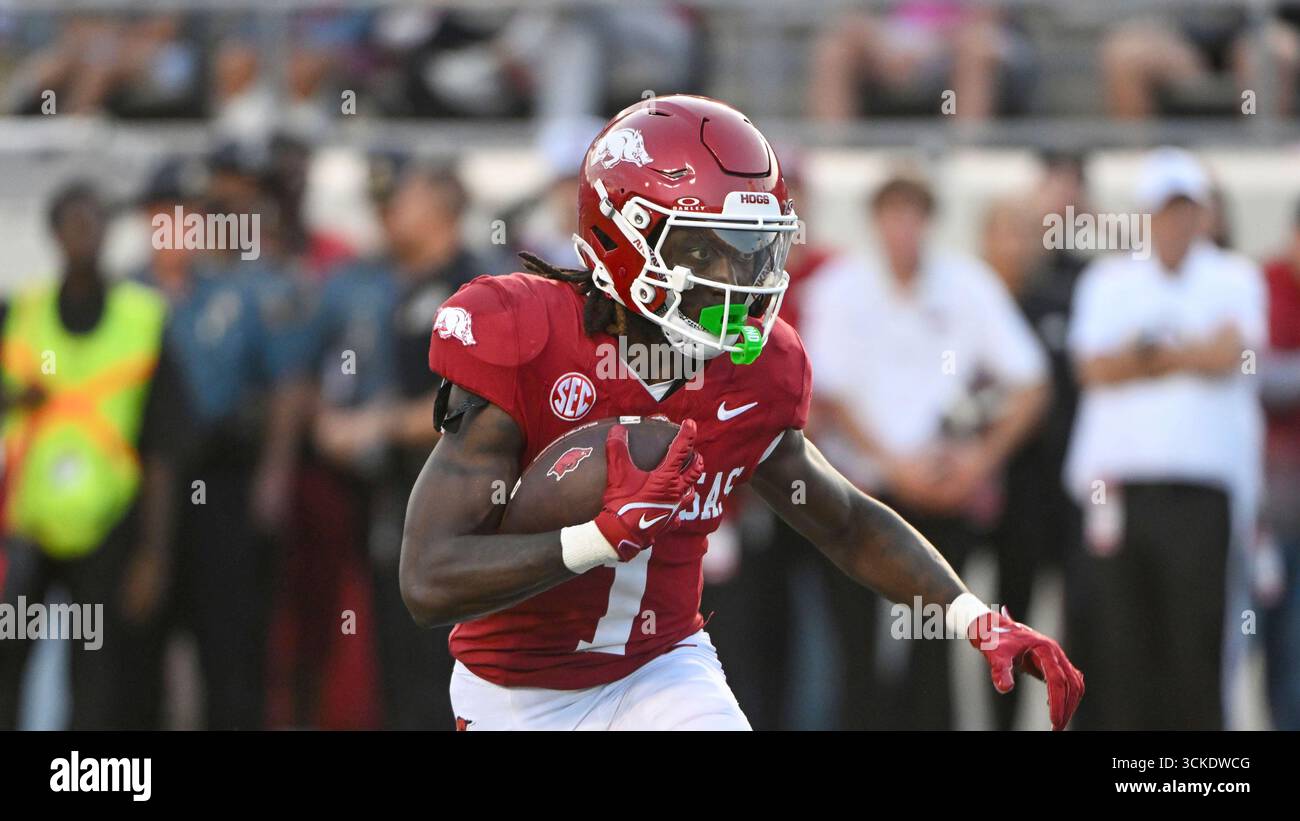 Arkansas running back Rodney Hill (1) runs against Arkansas State ...