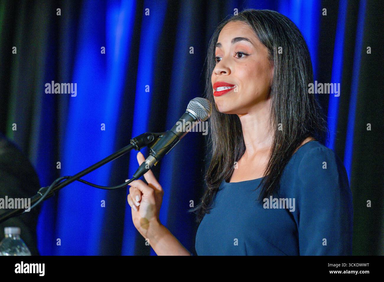 Amanda Edwards speaks on stage during 18th Congressional District Meet ...