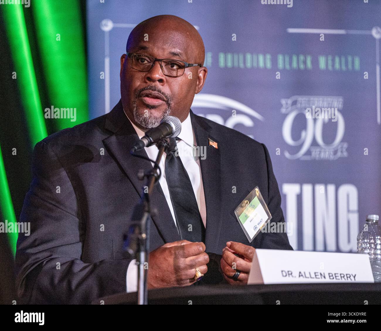 Dr. Allen Berry speaks on stage during the 18th Congressional District ...