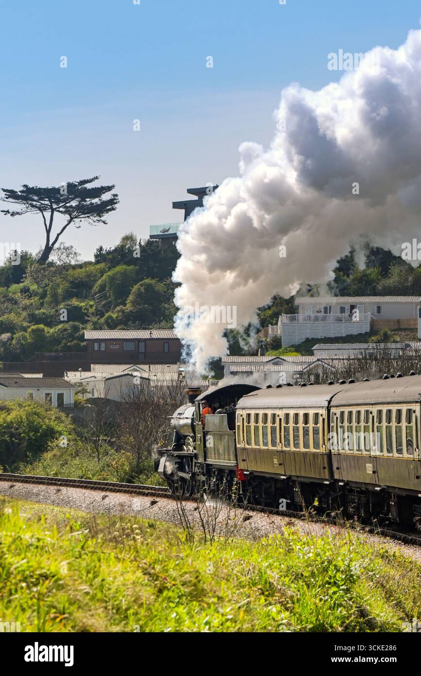 Steam train pulling coaches hi-res stock photography and images - Alamy