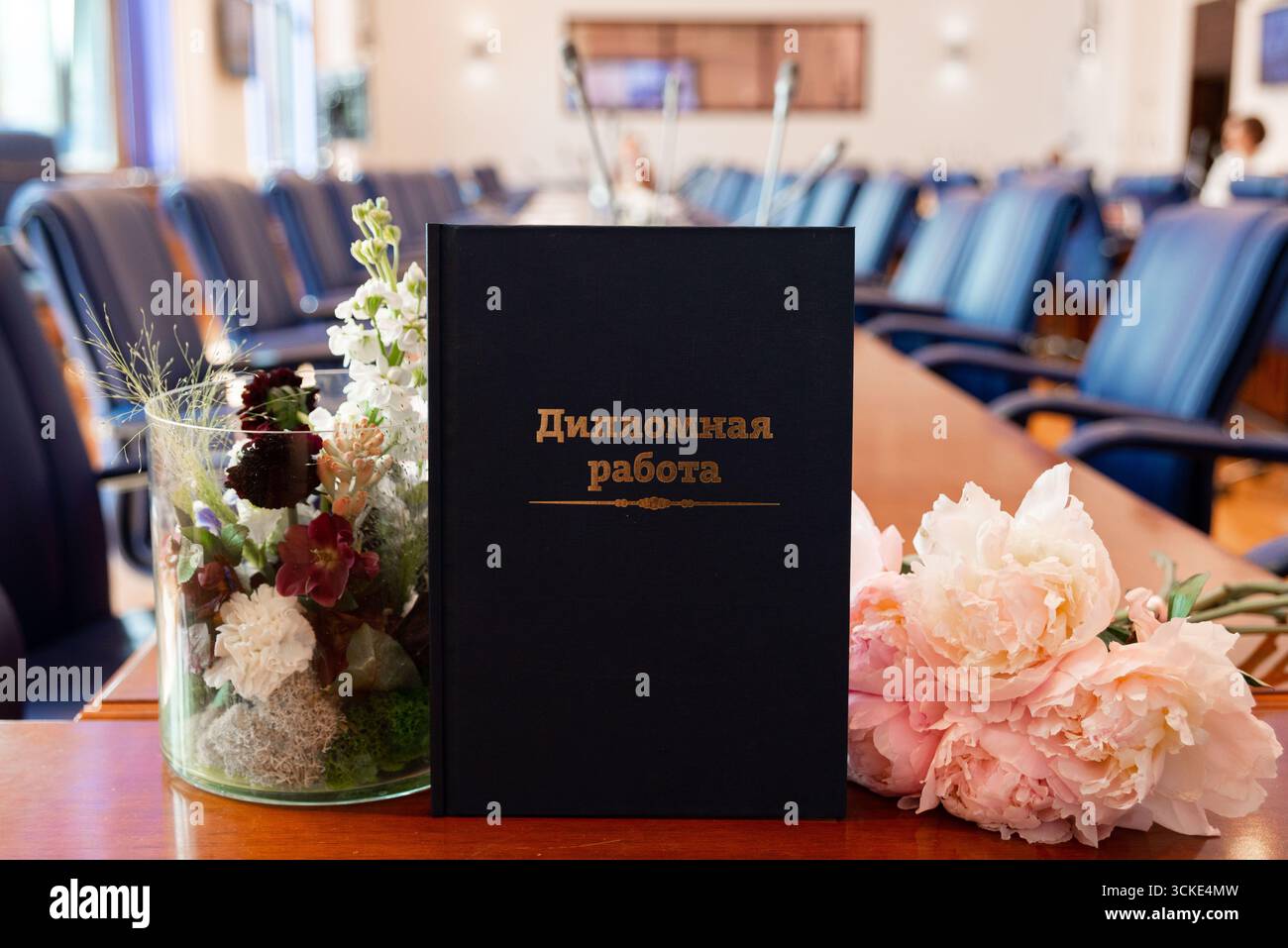 Graduation thesis display in elegant conference room setting Stock ...