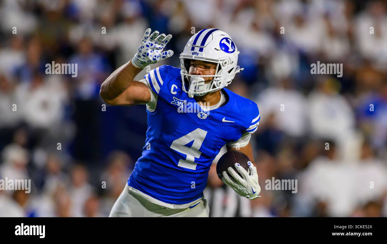 Brigham Young running back LJ Martin (4) runs the football during an ...