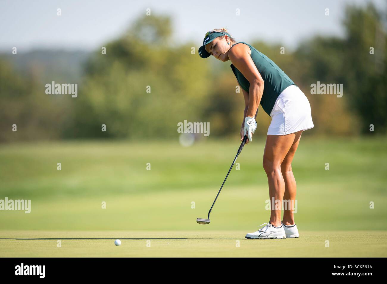 Lexi Thompson putts on the 18th green during the first round of the ...