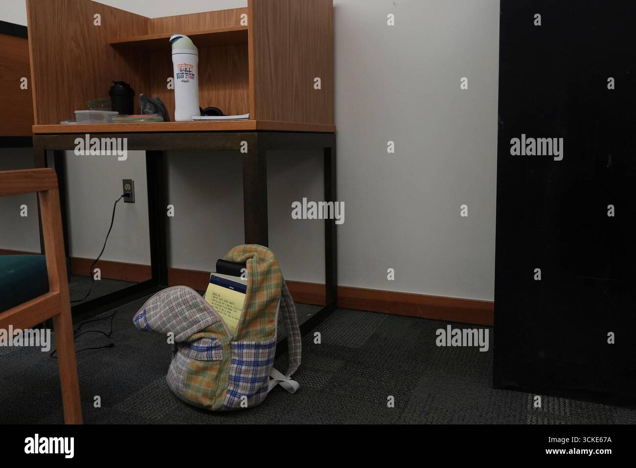 Water bottles and backpacks are left behind at the Pope Science ...