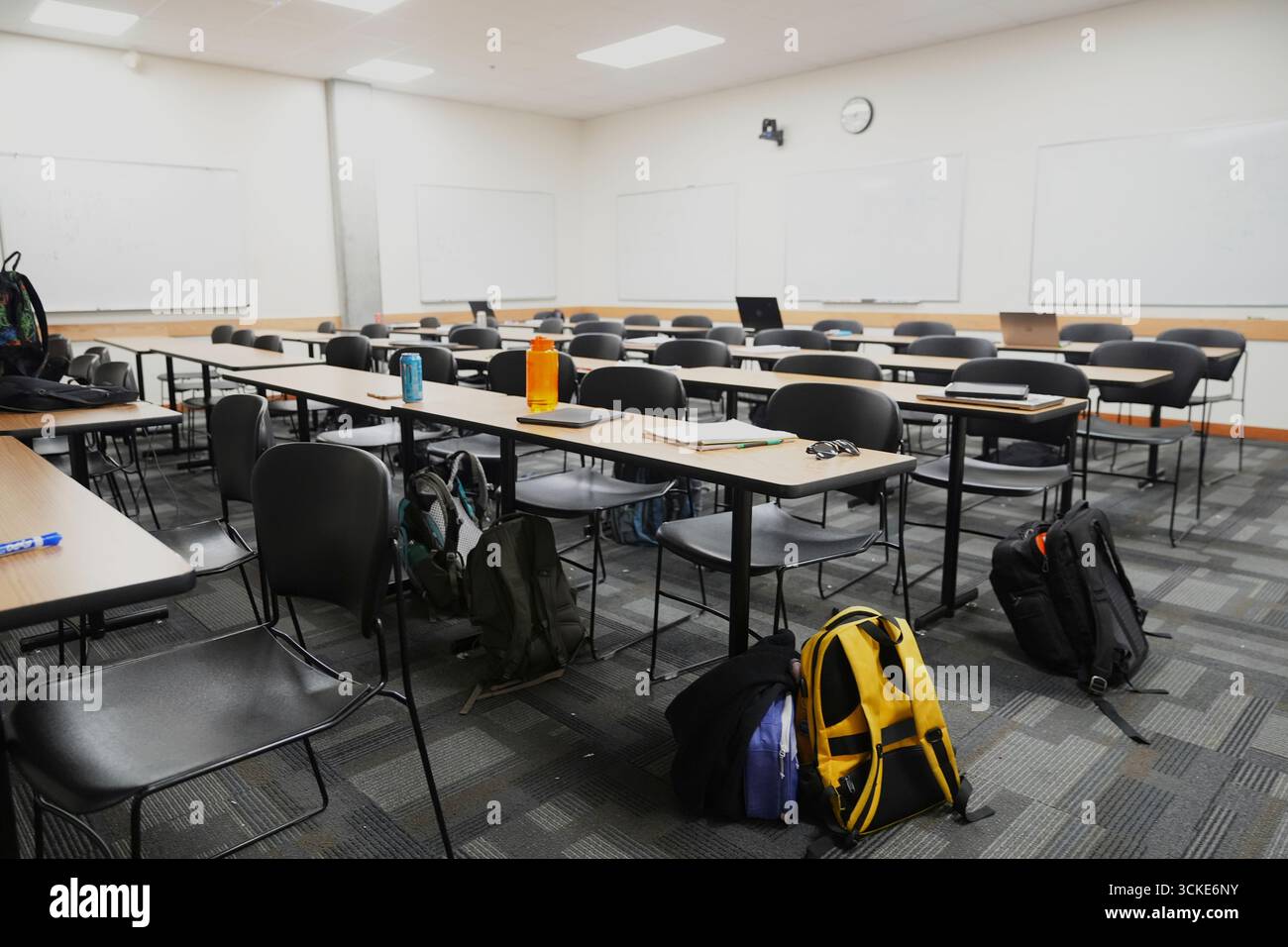 Student belongings are left behind in a classroom a day after the ...