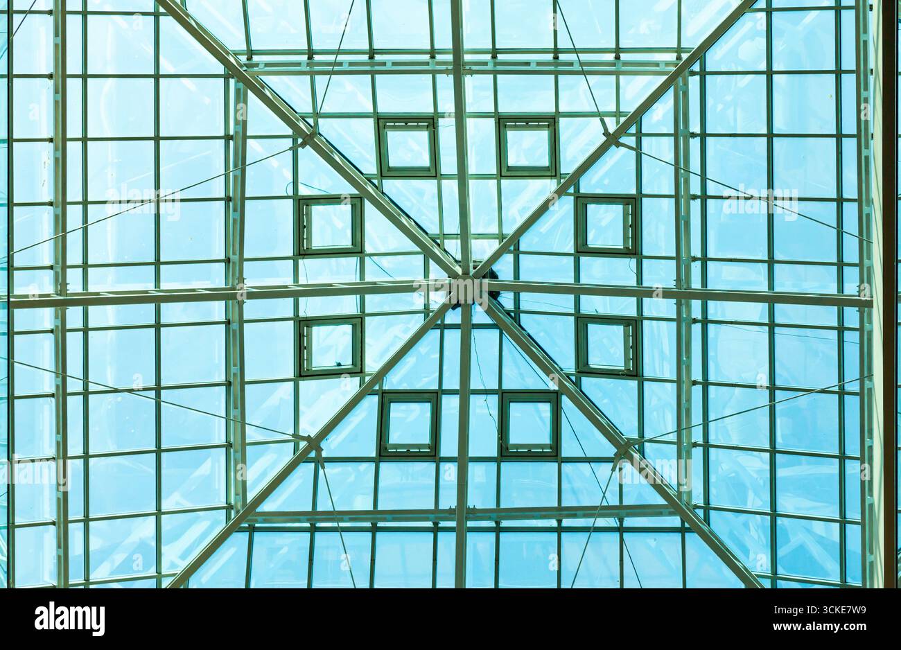 Transparent glass roof of a large building with a steel frame, view ...