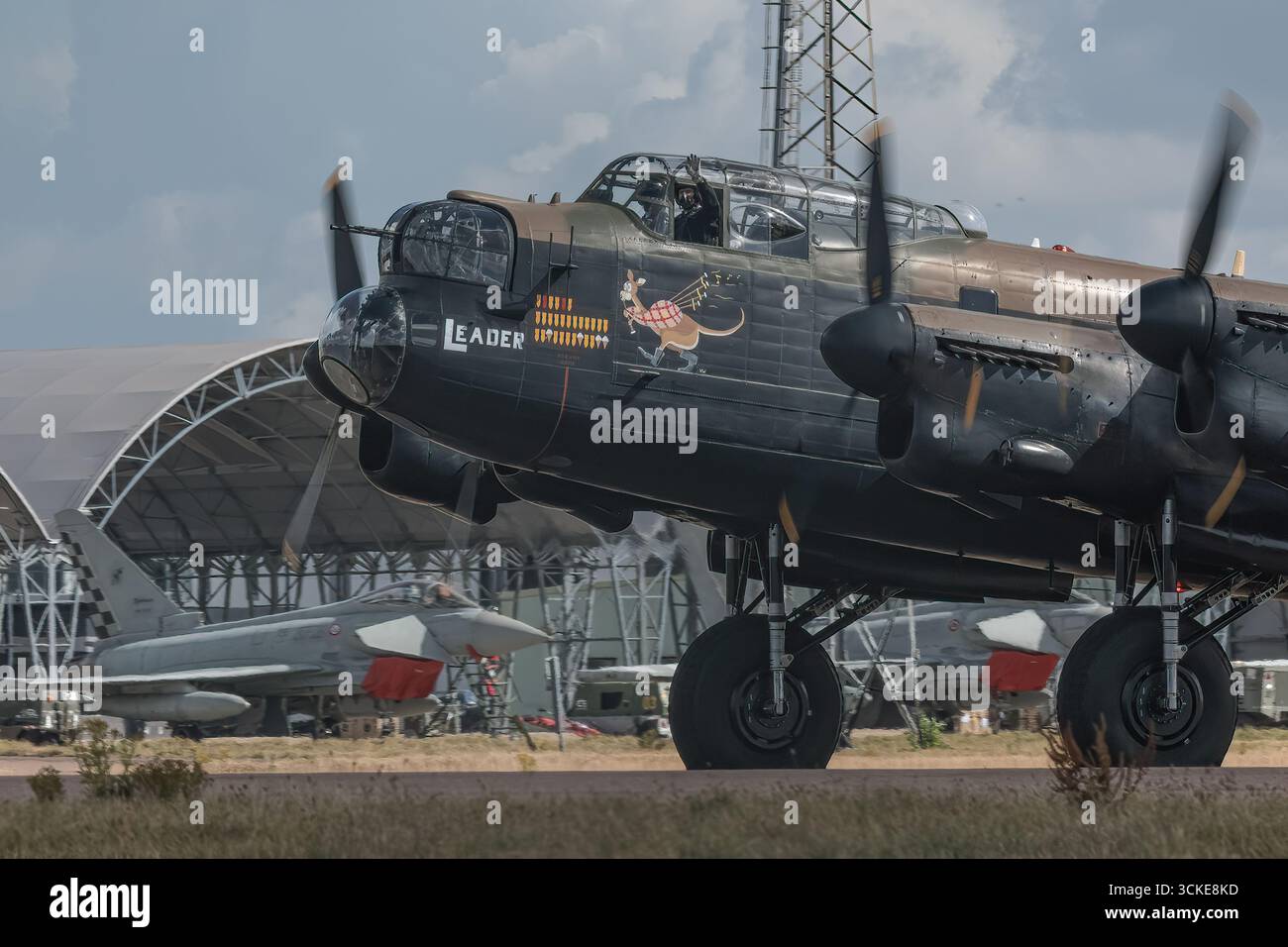 The pilot waves from the Battle of Britain Memorial Flight Avro ...